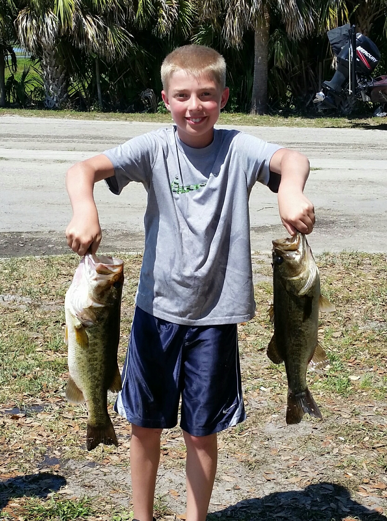 Darrell Hough with two giant bass at Lake Kissimmee biggest ever at 3. ...